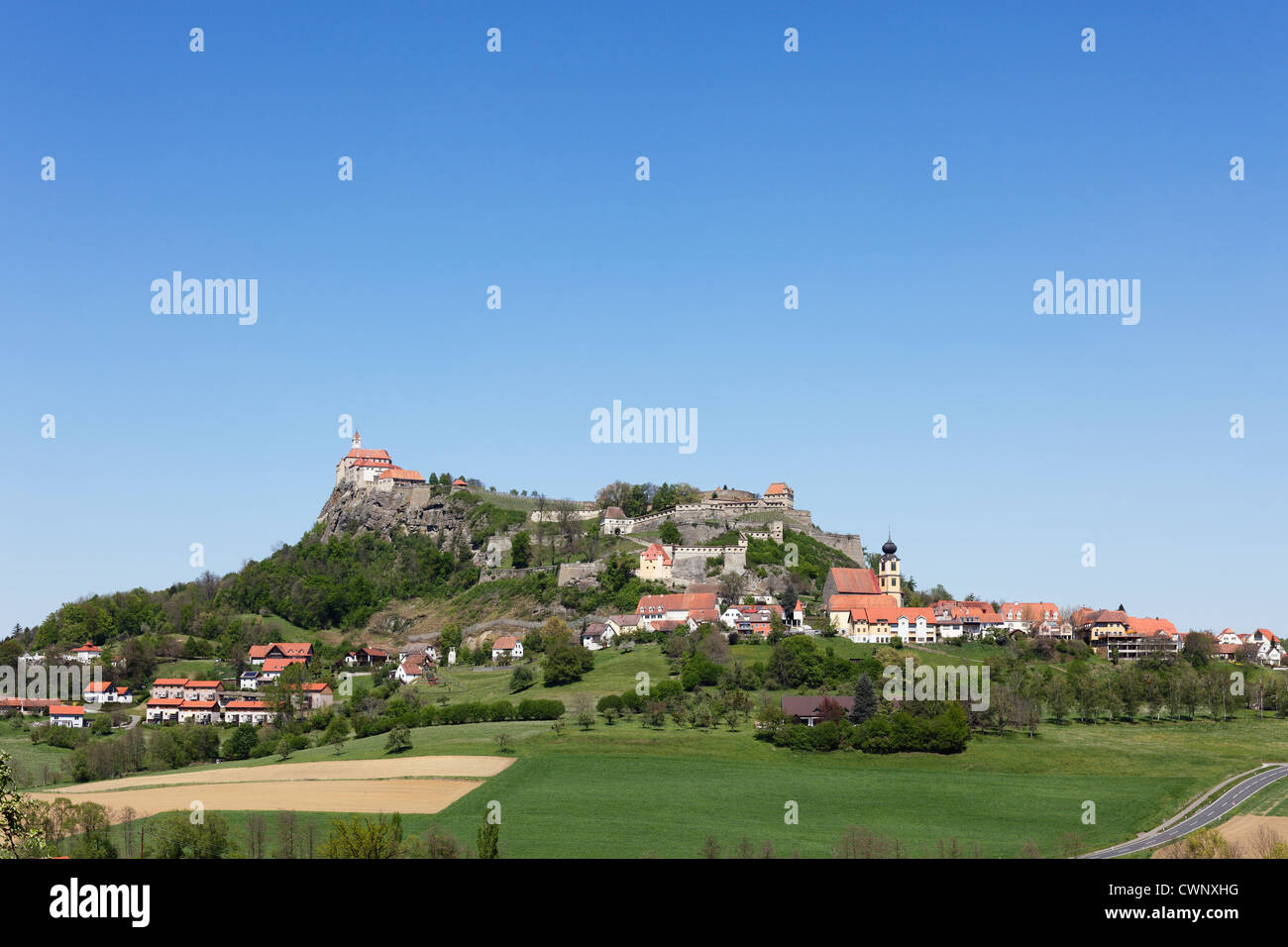 Austria, Styria, View of Riegersburg Castle with village Stock Photo ...