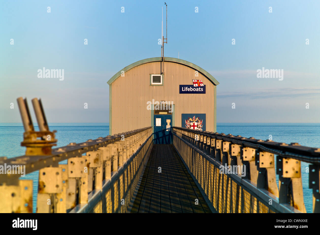 Selsey Lifeboat station seen from gangway with maroon, rocket launchers ...