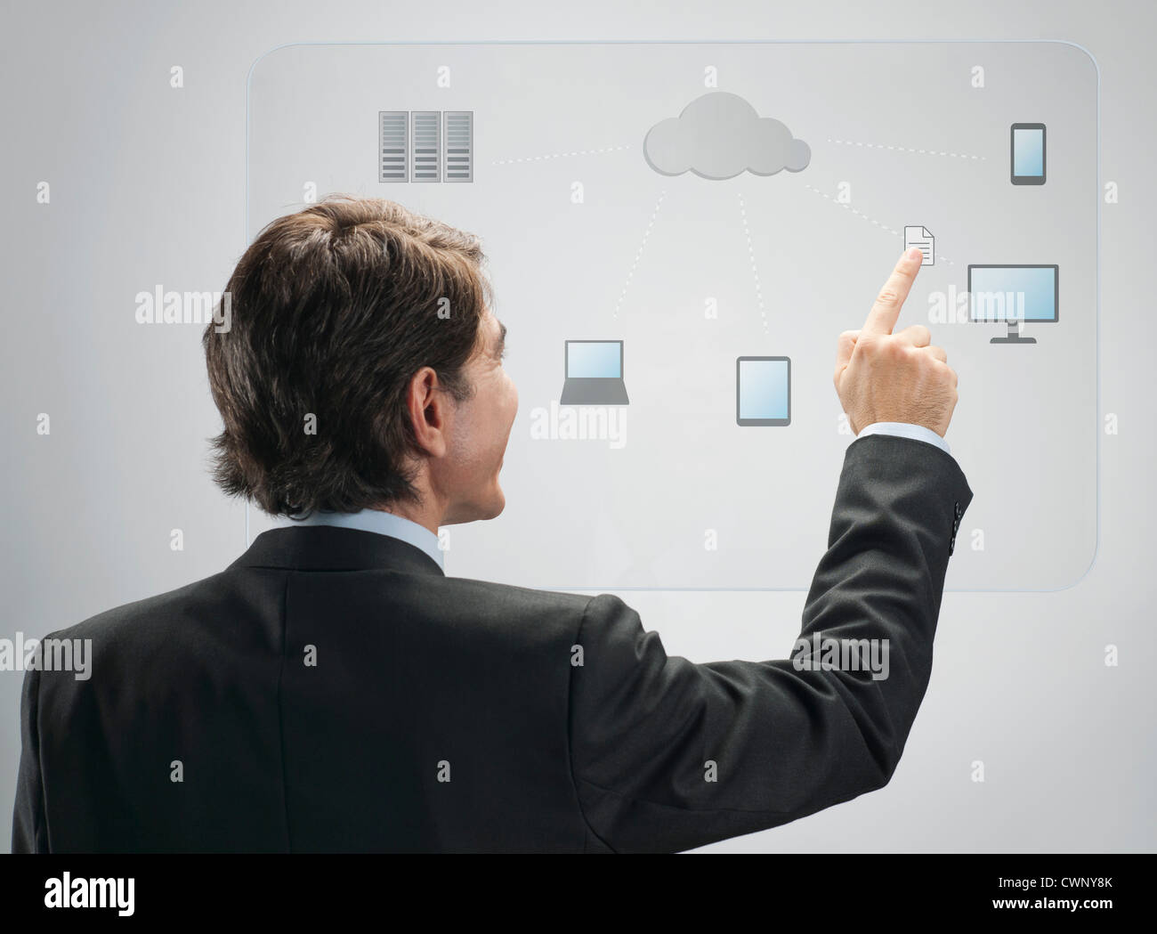 Businessman using cloud computing technology on advanced touch screen ...