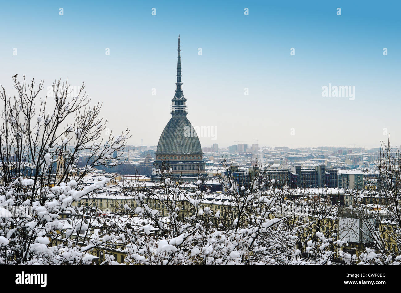 Turin, Italy, in winter. Snow covered roofs and Mole Antonelliana Stock ...