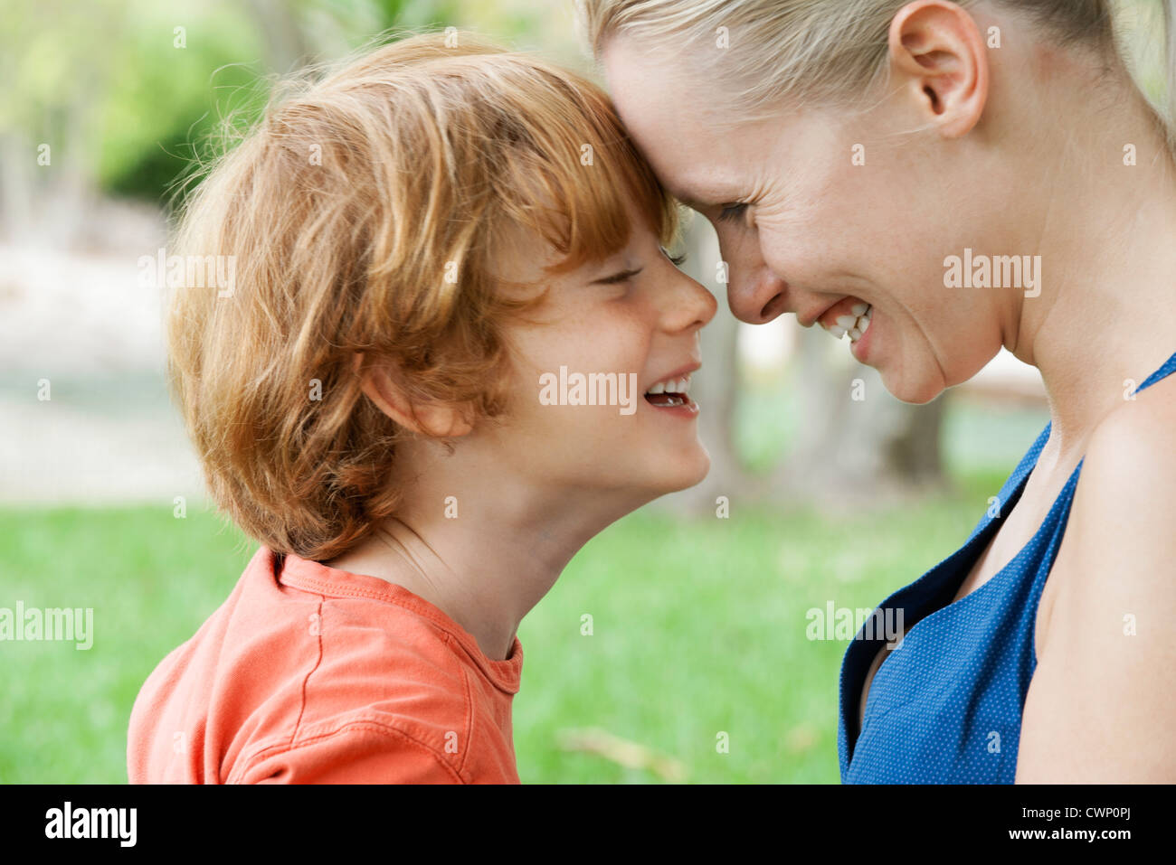 Mother and young son touching foreheads Stock Photo - Alamy
