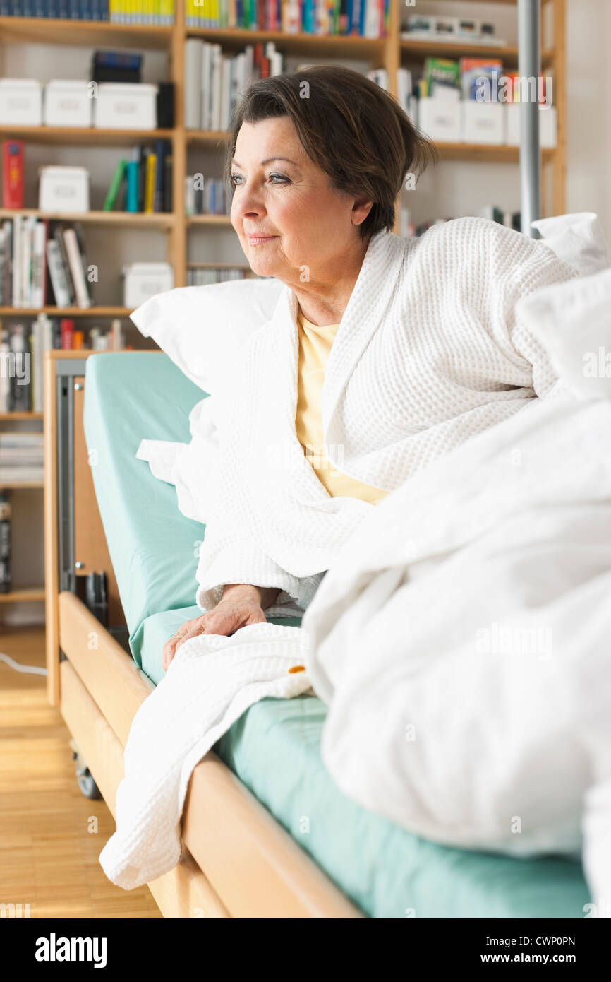 Person getting up from bed hi-res stock photography and images - Alamy