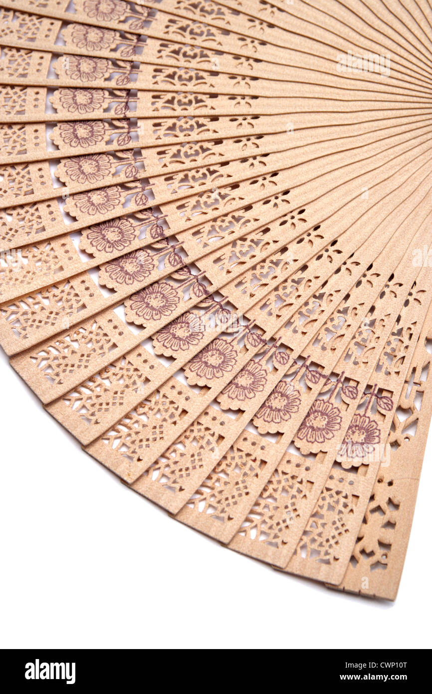 Details on Asian wooden hand fan Stock Photo - Alamy