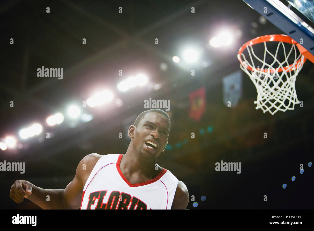 Basketball player shouting Stock Photo - Alamy