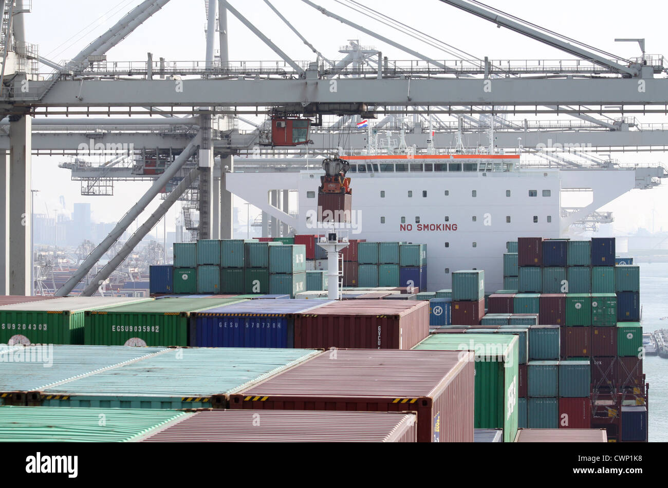 Containers stacked on deck of ship, Port of Rotterdam Stock Photo - Alamy