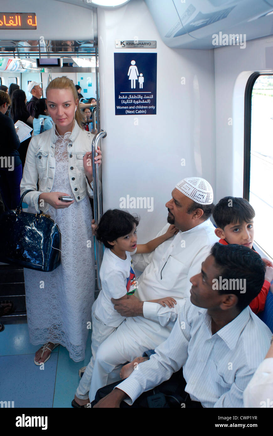 Passengers on Dubai Metro, UAE, United Arab Emirates, South East ...