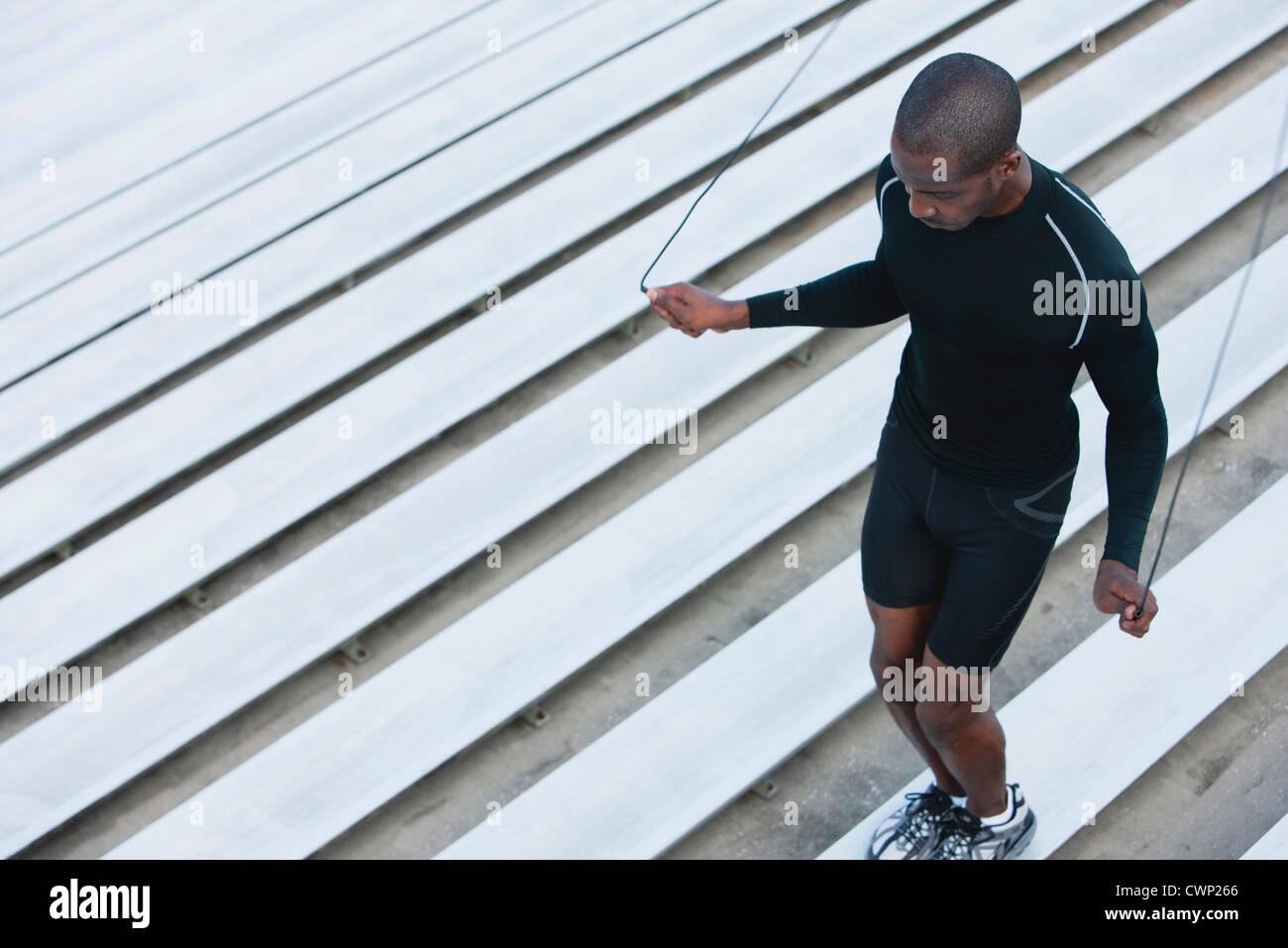 Man jumping on jump rope hi-res stock photography and images - Alamy