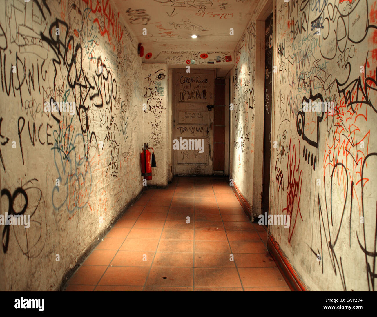 Corridor walls covered with graffiti Stock Photo - Alamy