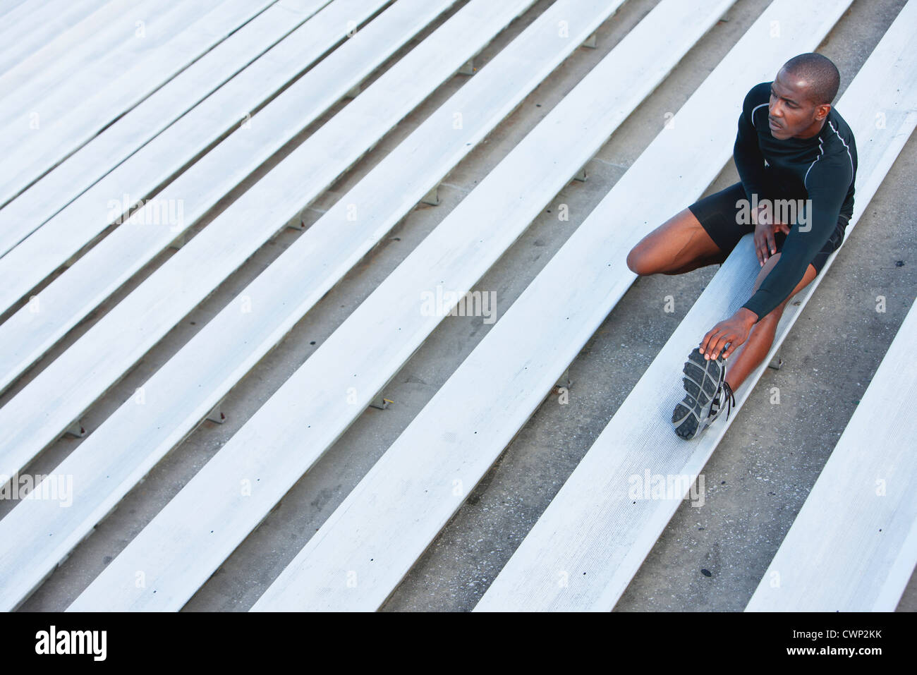 Bleachers athlete stretching man hi-res stock photography and images ...