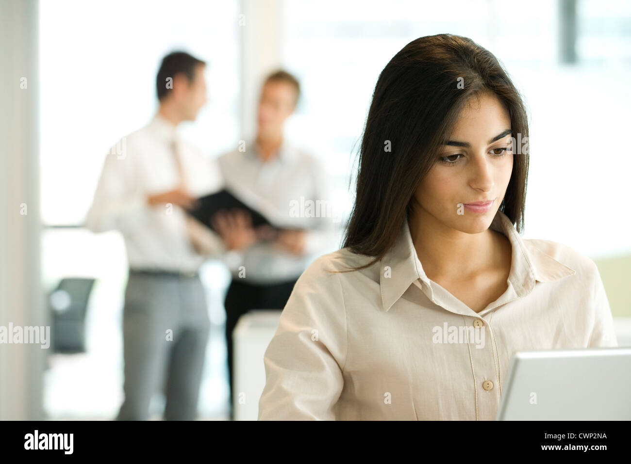 Professional woman working in office Stock Photo - Alamy