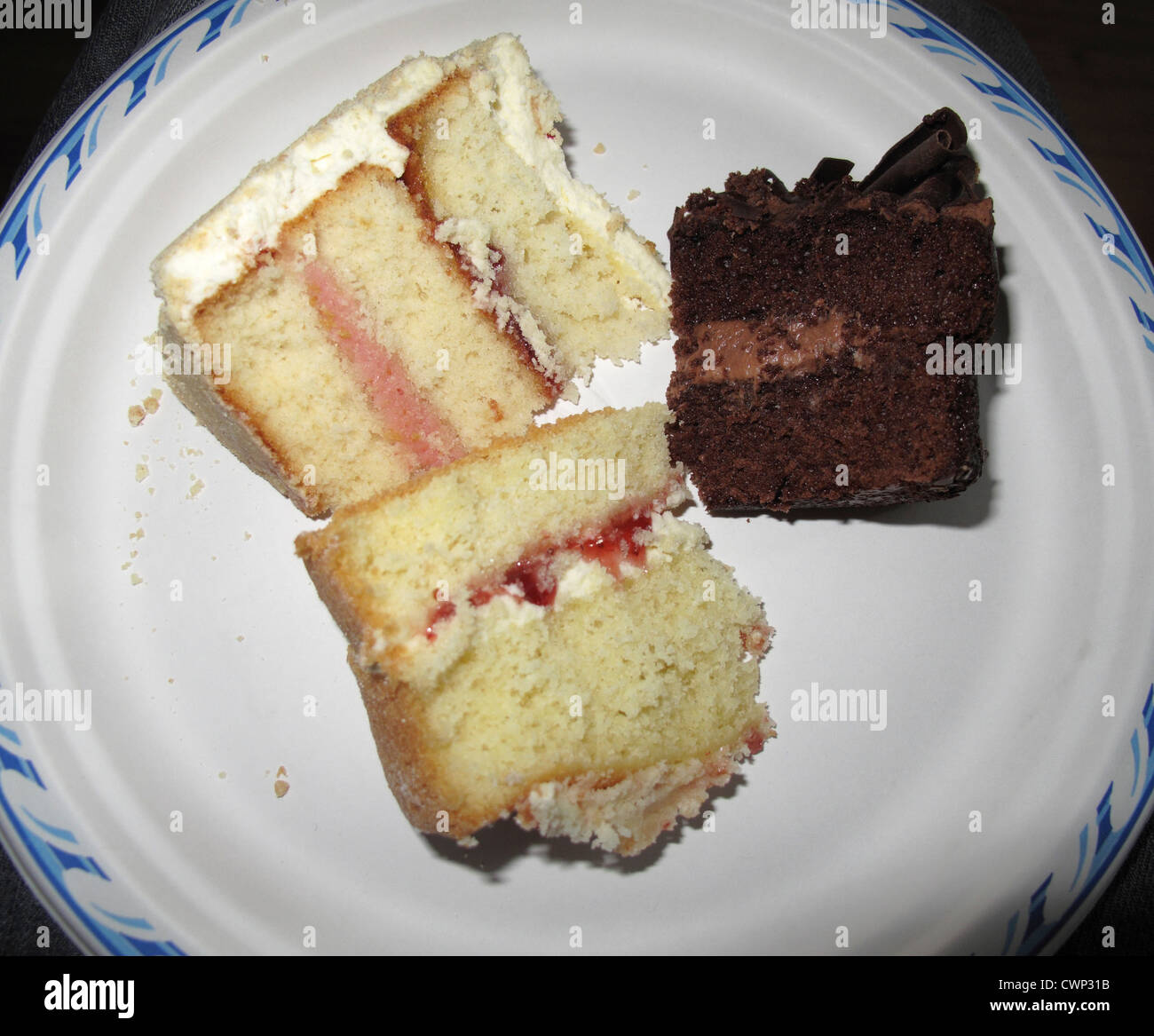 Slices of cake on paper plate Stock Photo - Alamy