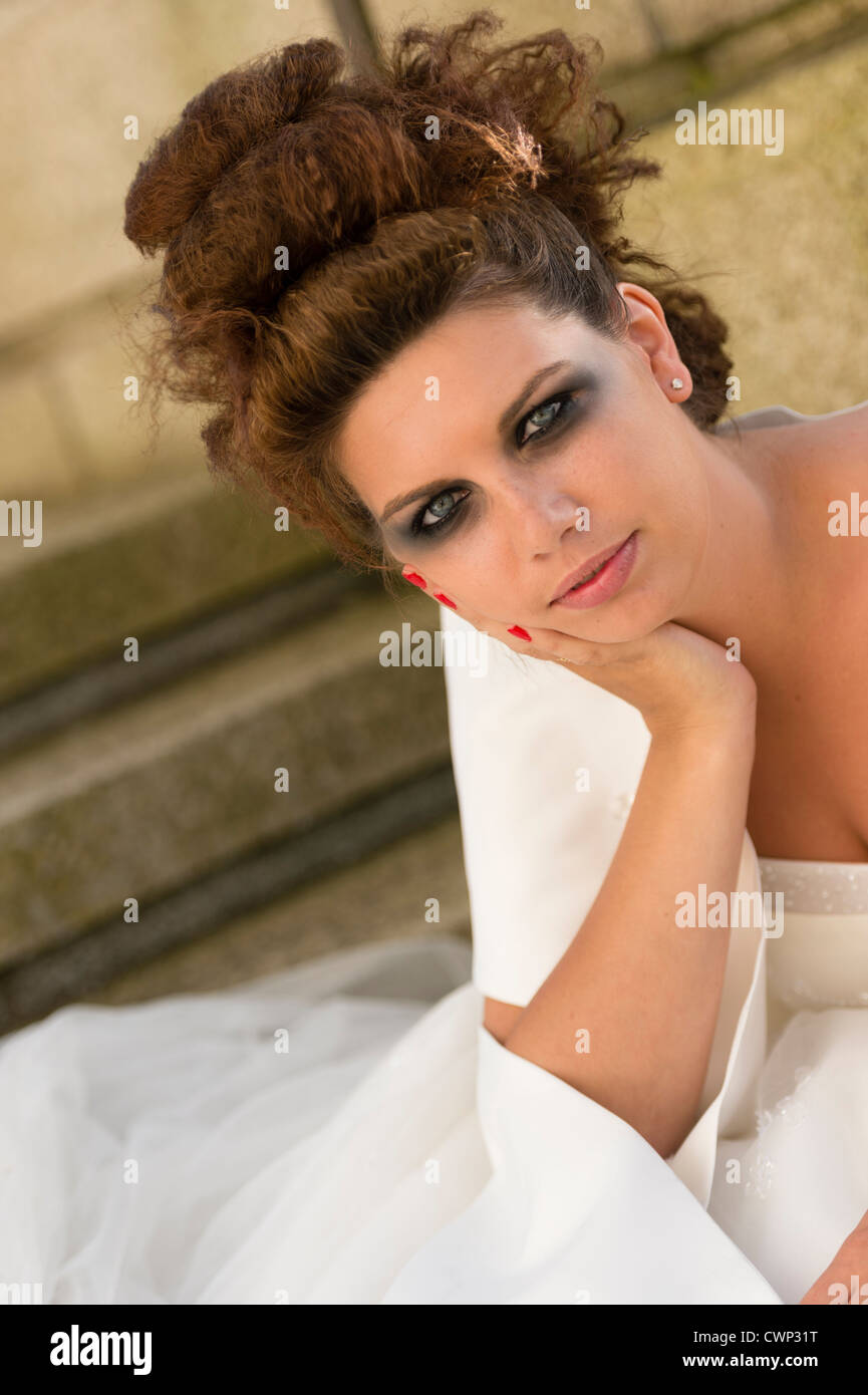 a young attractive woman in an Alt alternative bride fashion shoot, on ...