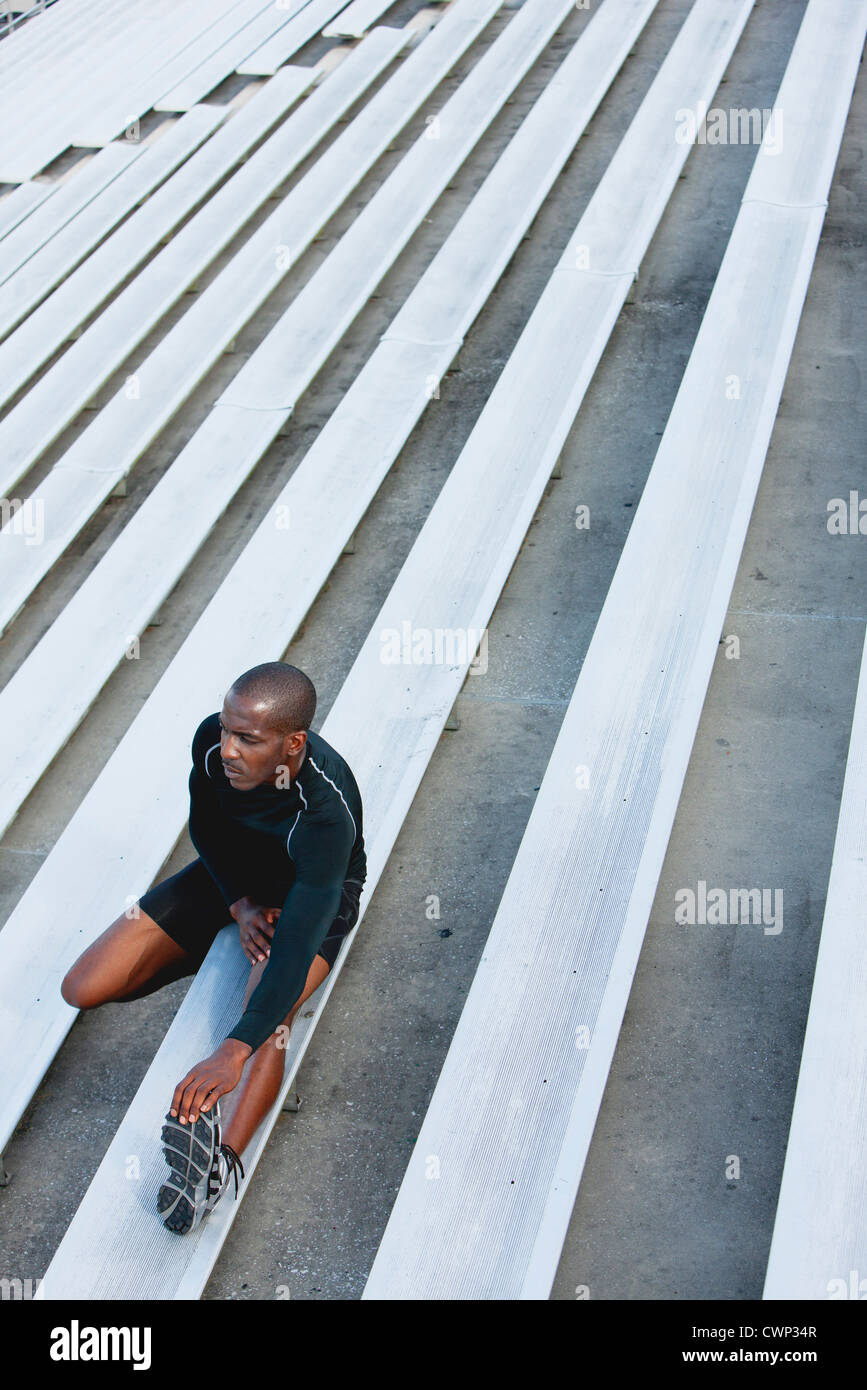Bleachers athlete stretching man hi-res stock photography and images ...