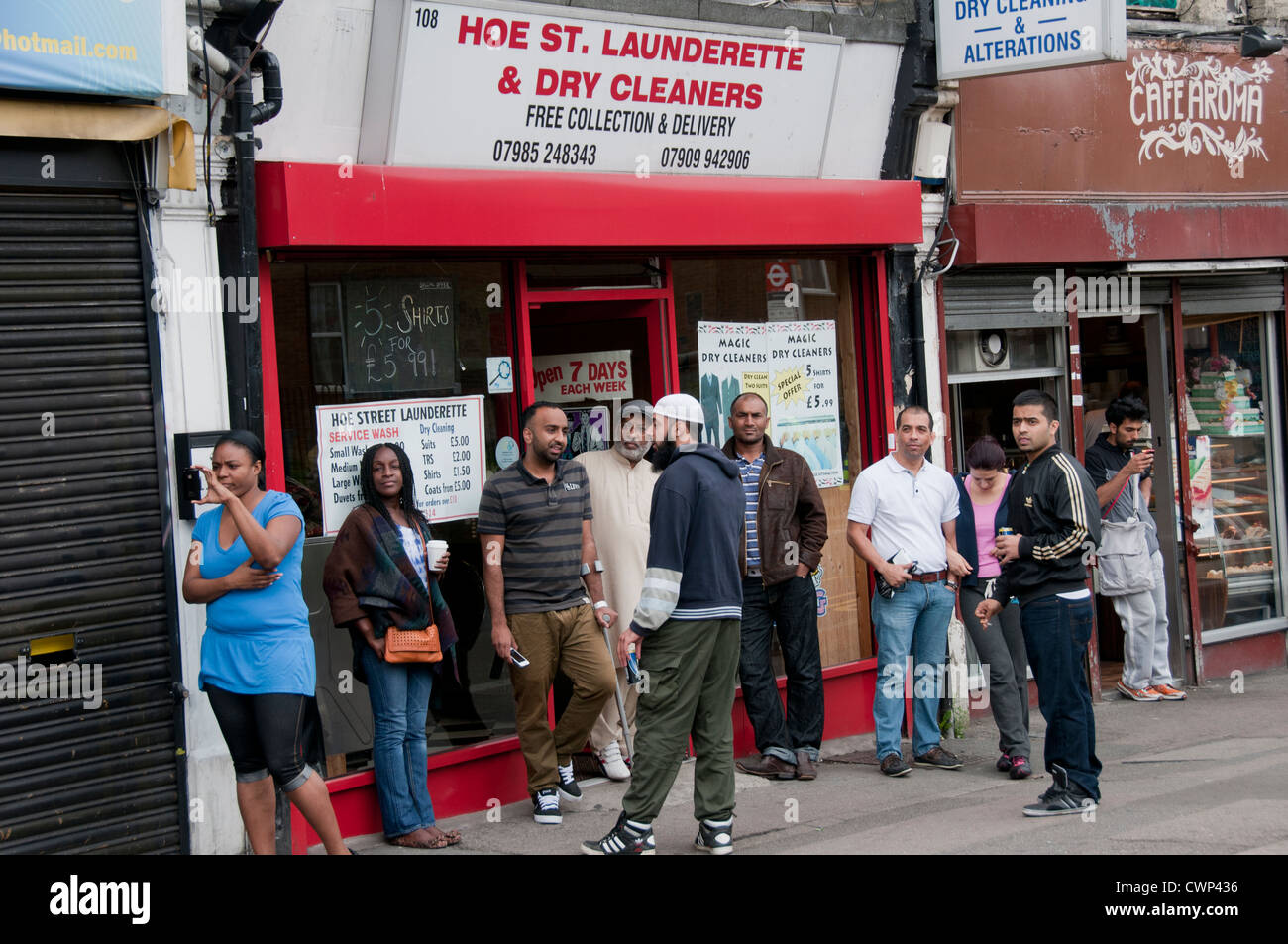 Multicultural street scenes in Walthamstow outside Laundrette in North ...