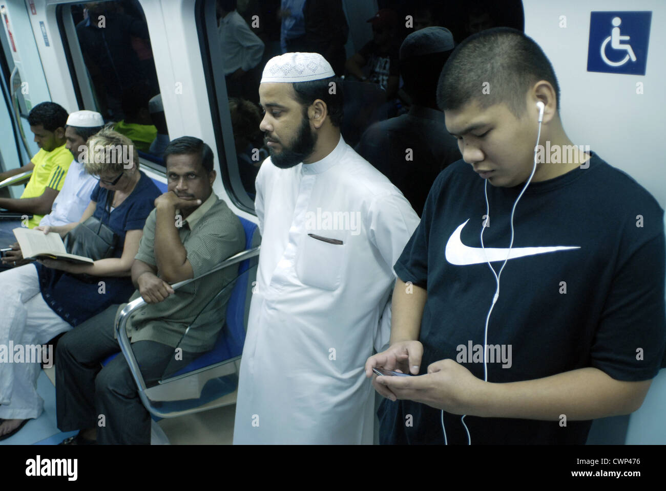 Passengers on Dubai Metro, UAE, United Arab Emirates, South East ...