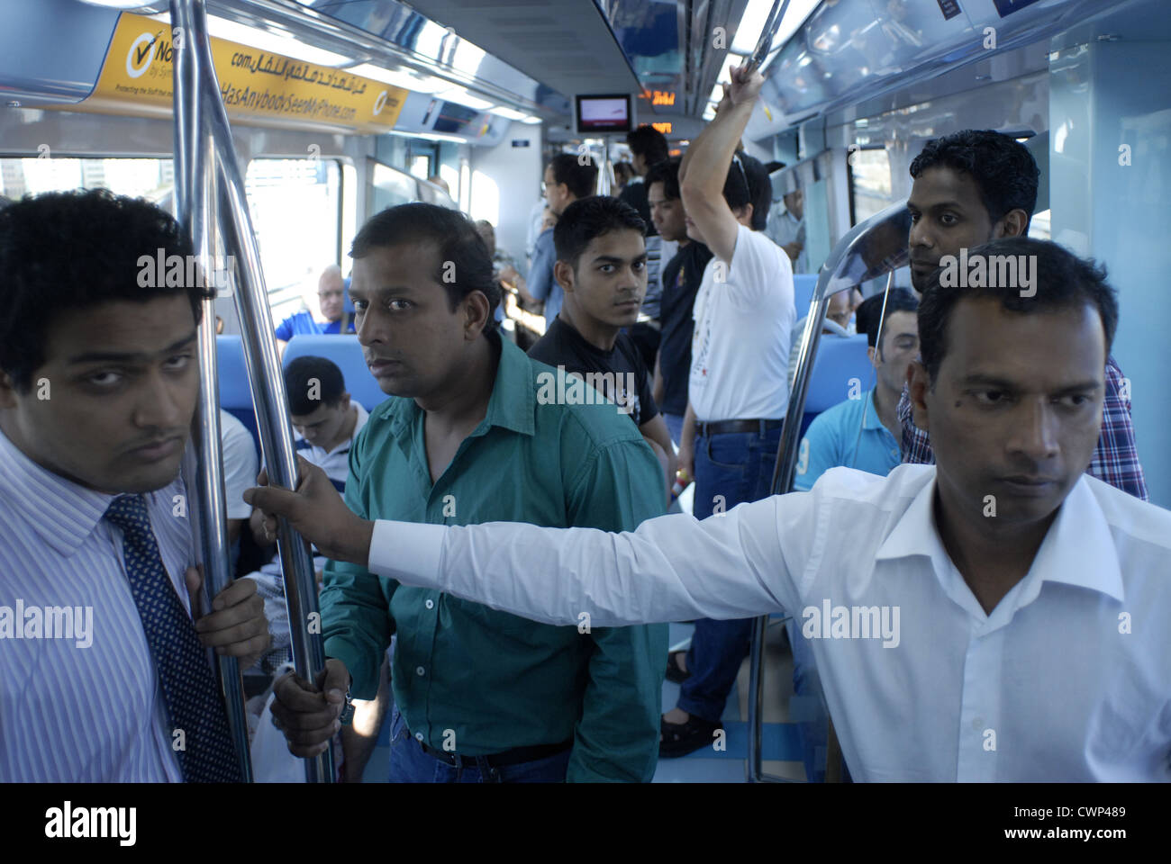 Passengers on Dubai Metro, UAE, United Arab Emirates, South East ...