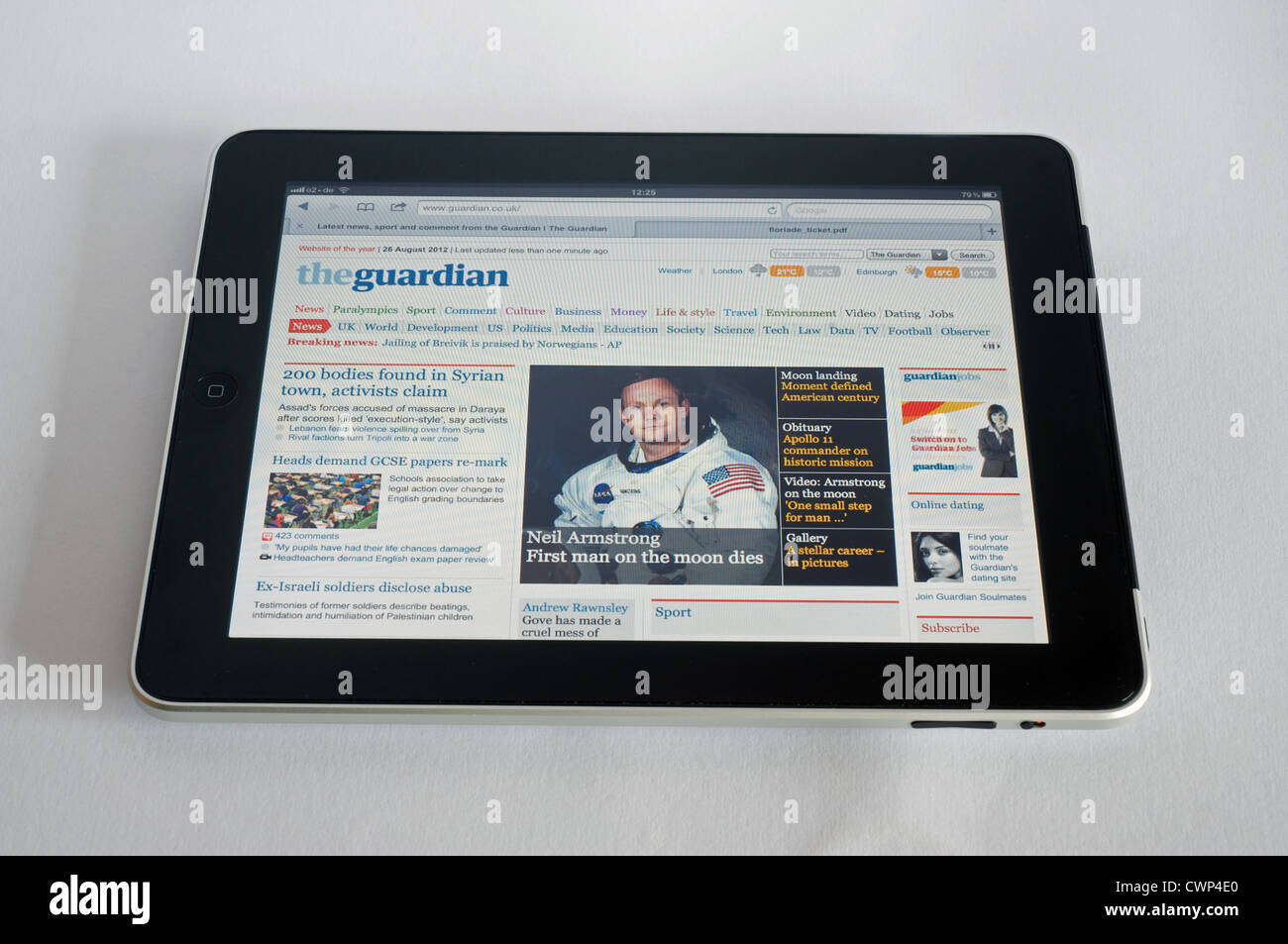 Electronic edition of The Guardian newspaper displayed on an Apple iPad ...