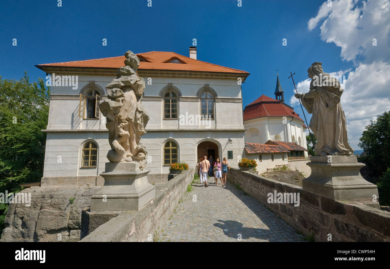 Statues on bridge in front of Valdštejn castle in Český ráj area in ...