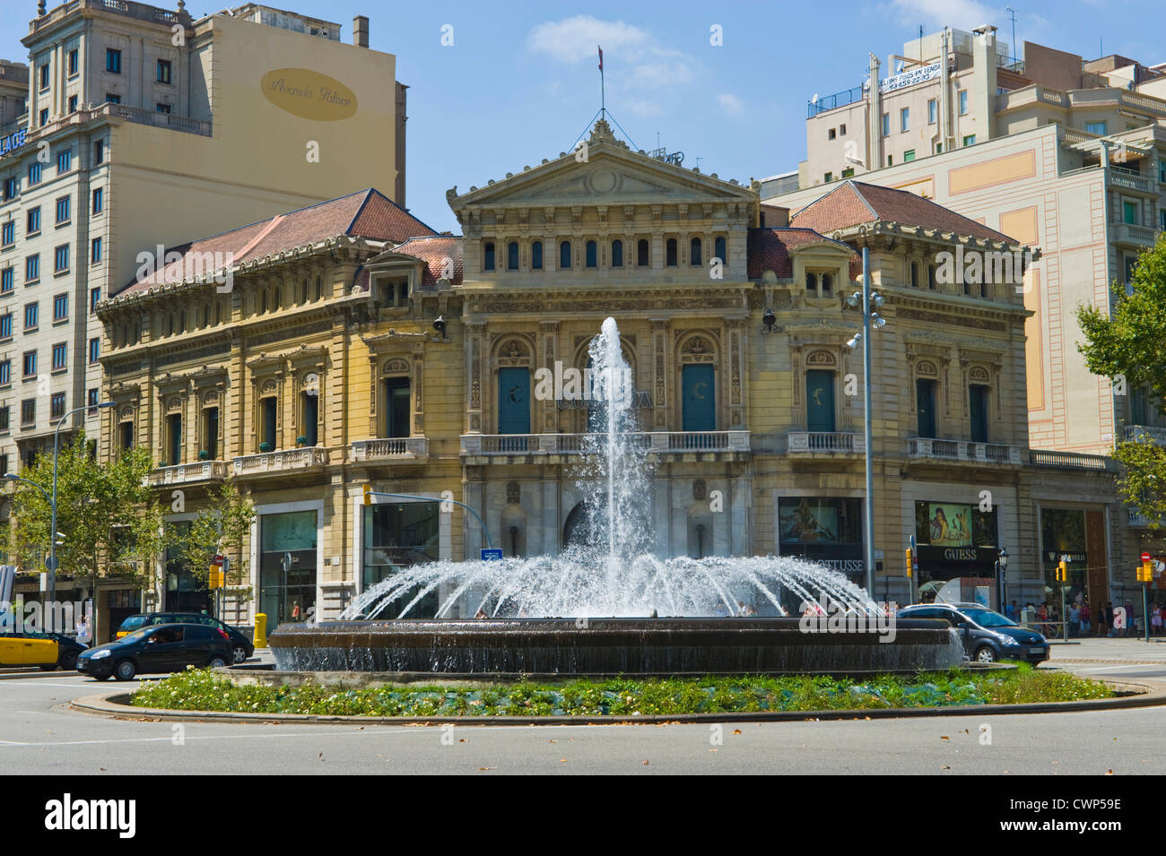 Large ornamental water fountain on roundabout in Barcelona, Catalonia ...