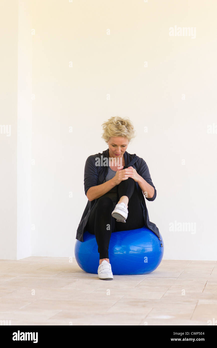 Hugging Knee High Resolution Stock Photography and Images - Alamy