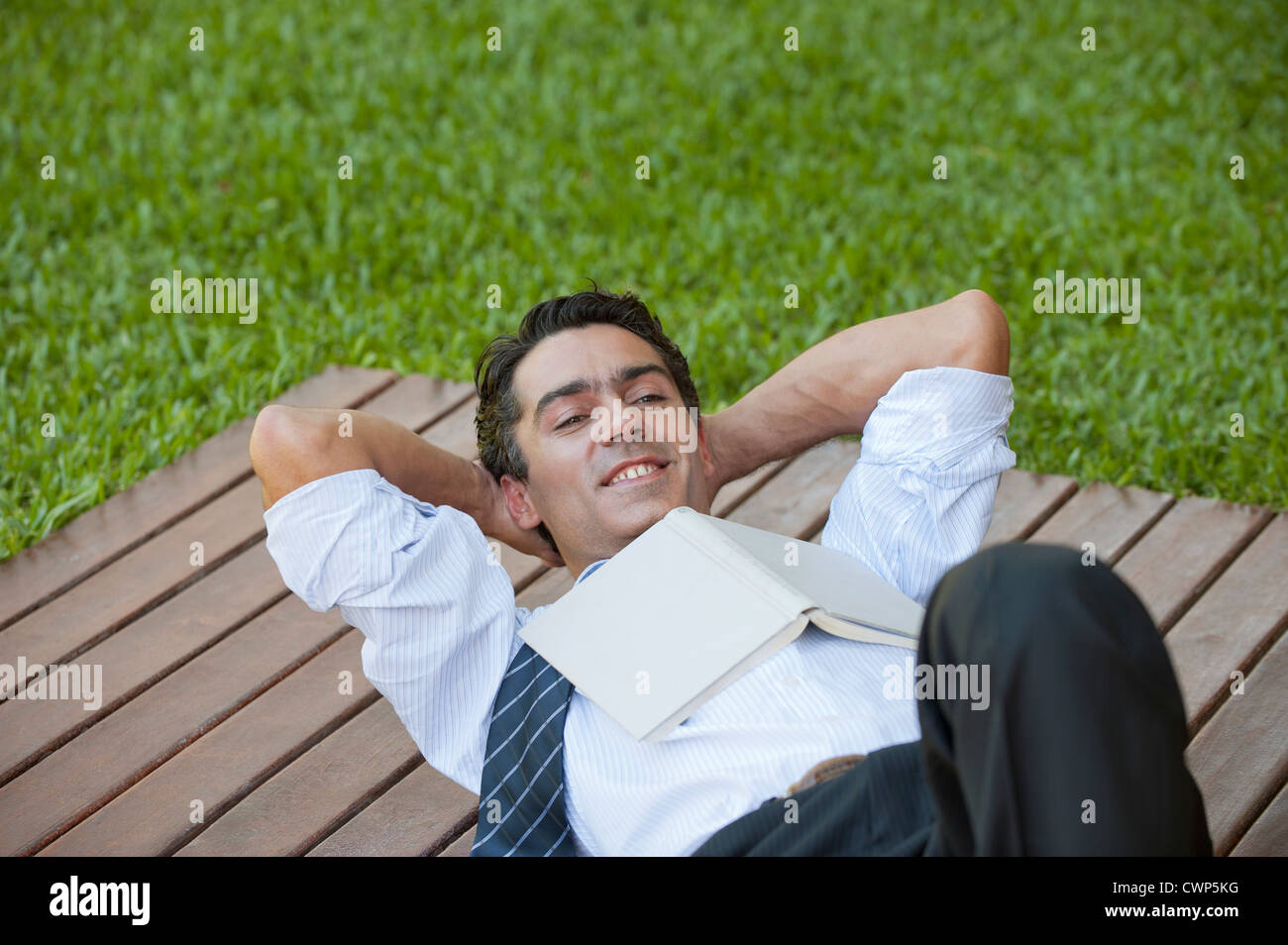 Man reading book from behind hi-res stock photography and images - Alamy