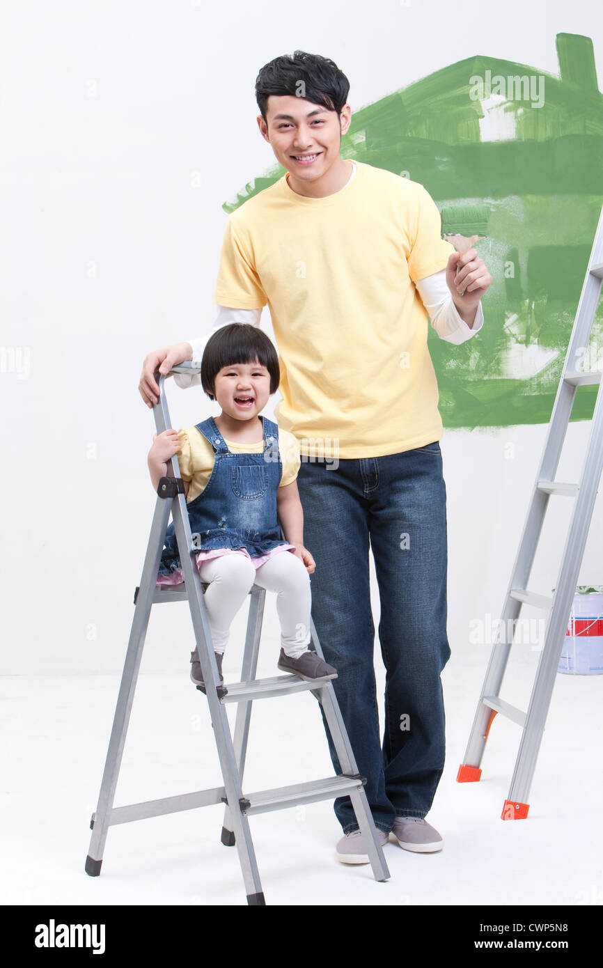 Father and daughter doing DIY home improvement Stock Photo - Alamy