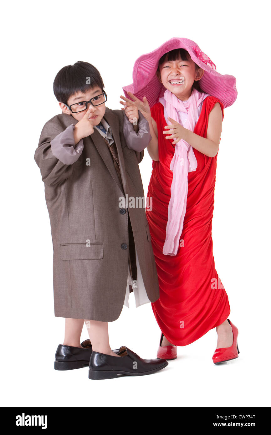 Boy and girl dressing up like adults Stock Photo - Alamy