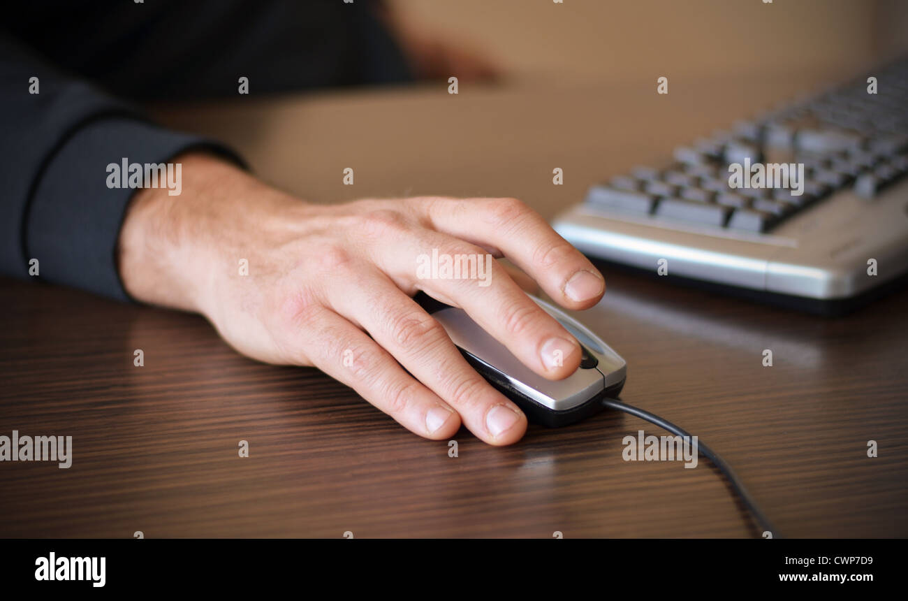 Hand on a computer mouse hi-res stock photography and images - Alamy