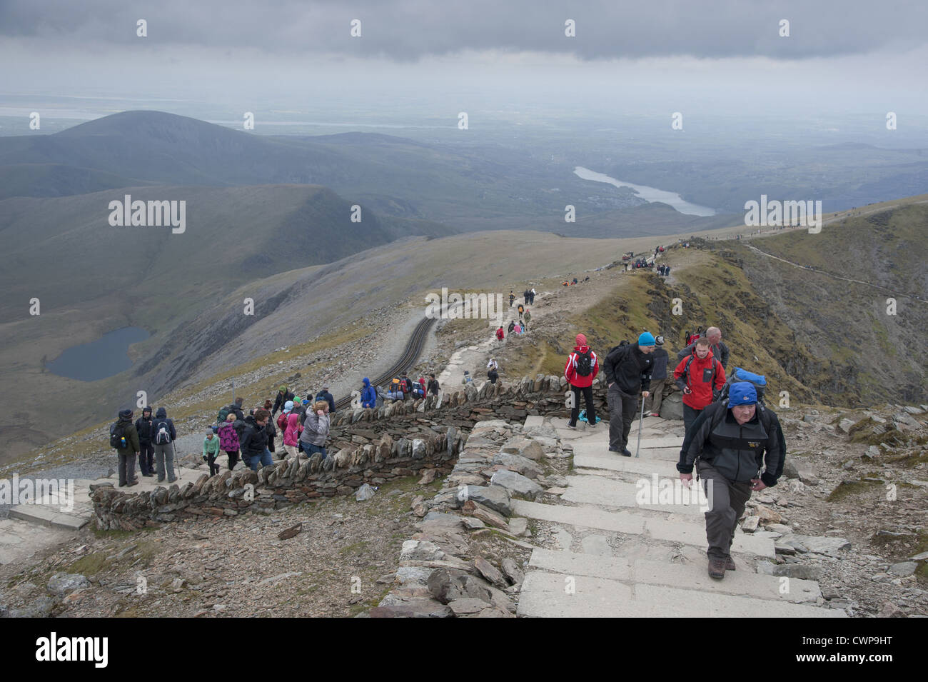 Walkers on steps near mountain summit, Snowdon, Snowdonia N.P., Gwynedd ...
