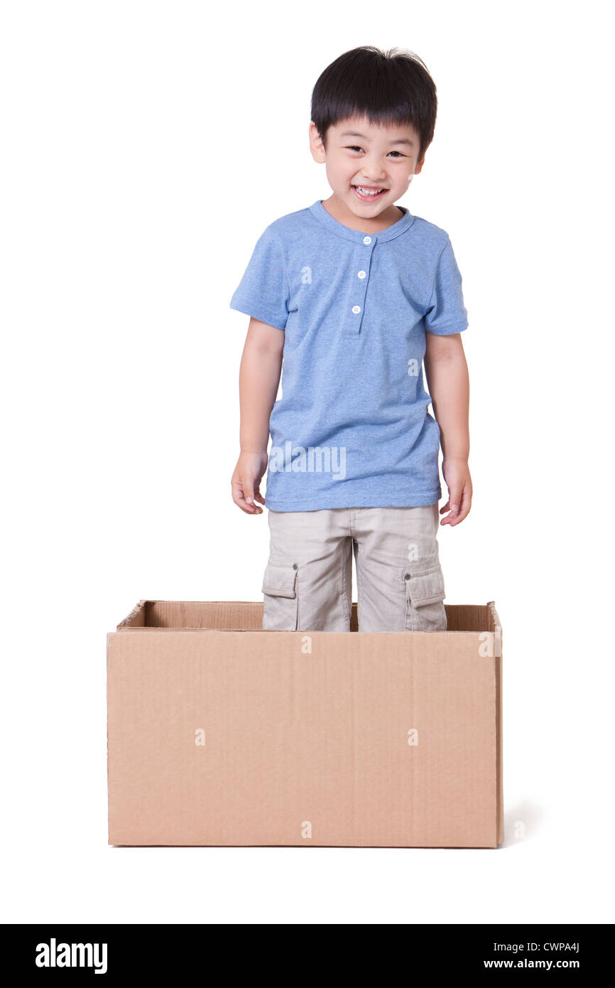 Boy standing in front Cut Out Stock Images & Pictures - Alamy