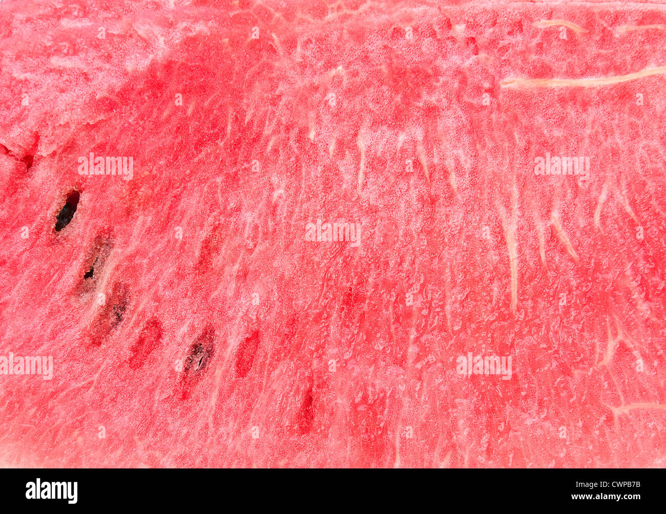 Watermelon red fruit closeup background Stock Photo - Alamy