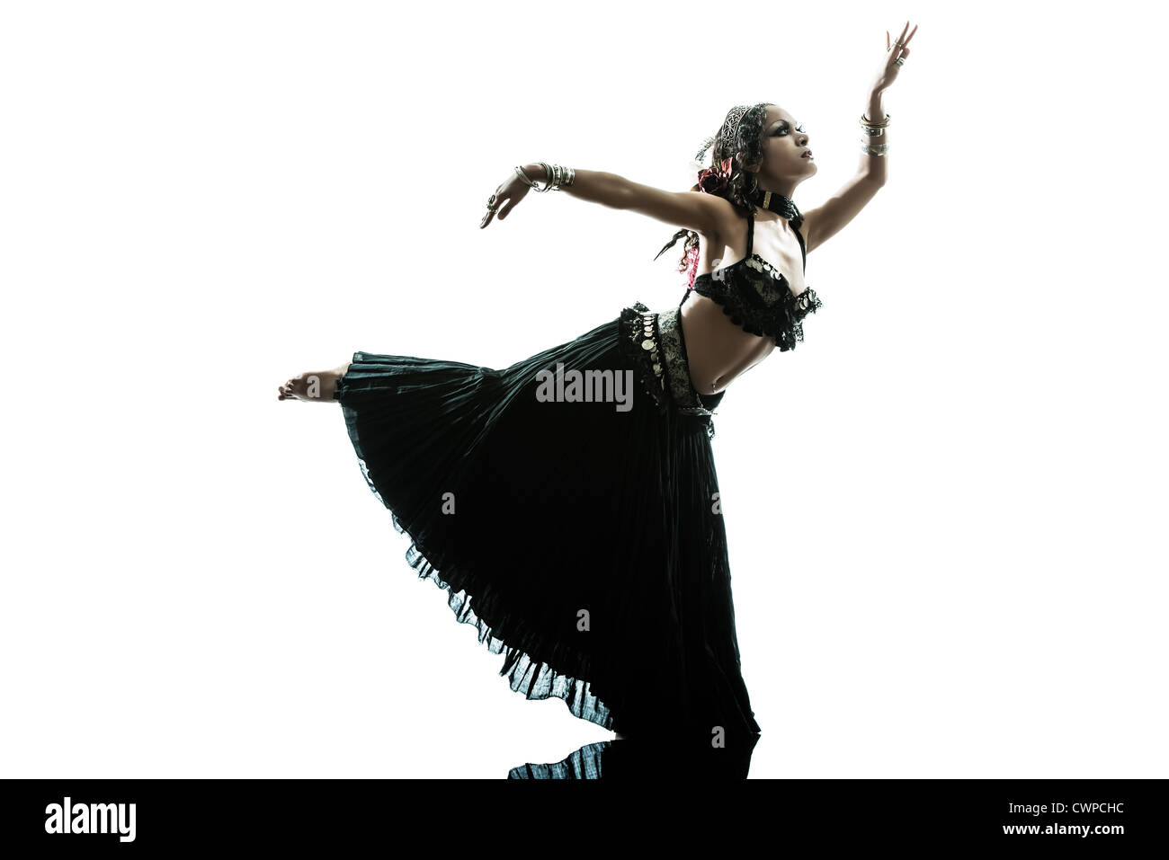 one arabic woman belly dancer dancing silhouette studio isolated on ...