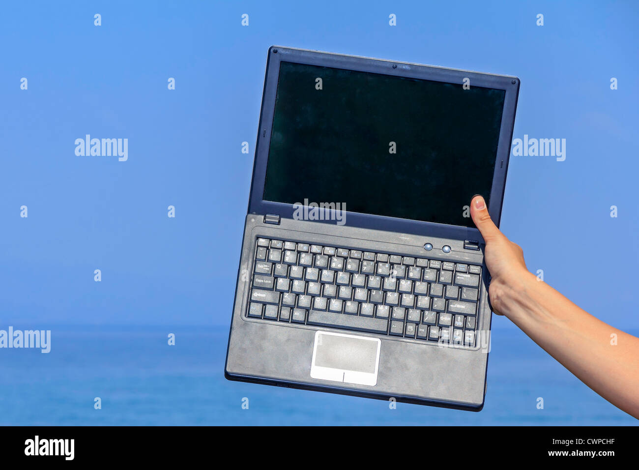 White female holding laptop computer hi-res stock photography and ...
