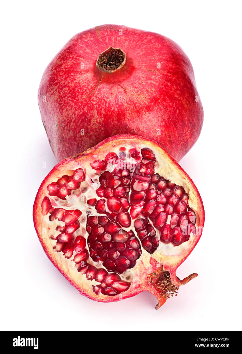 Pomegranate fruit closeup on white background Stock Photo - Alamy