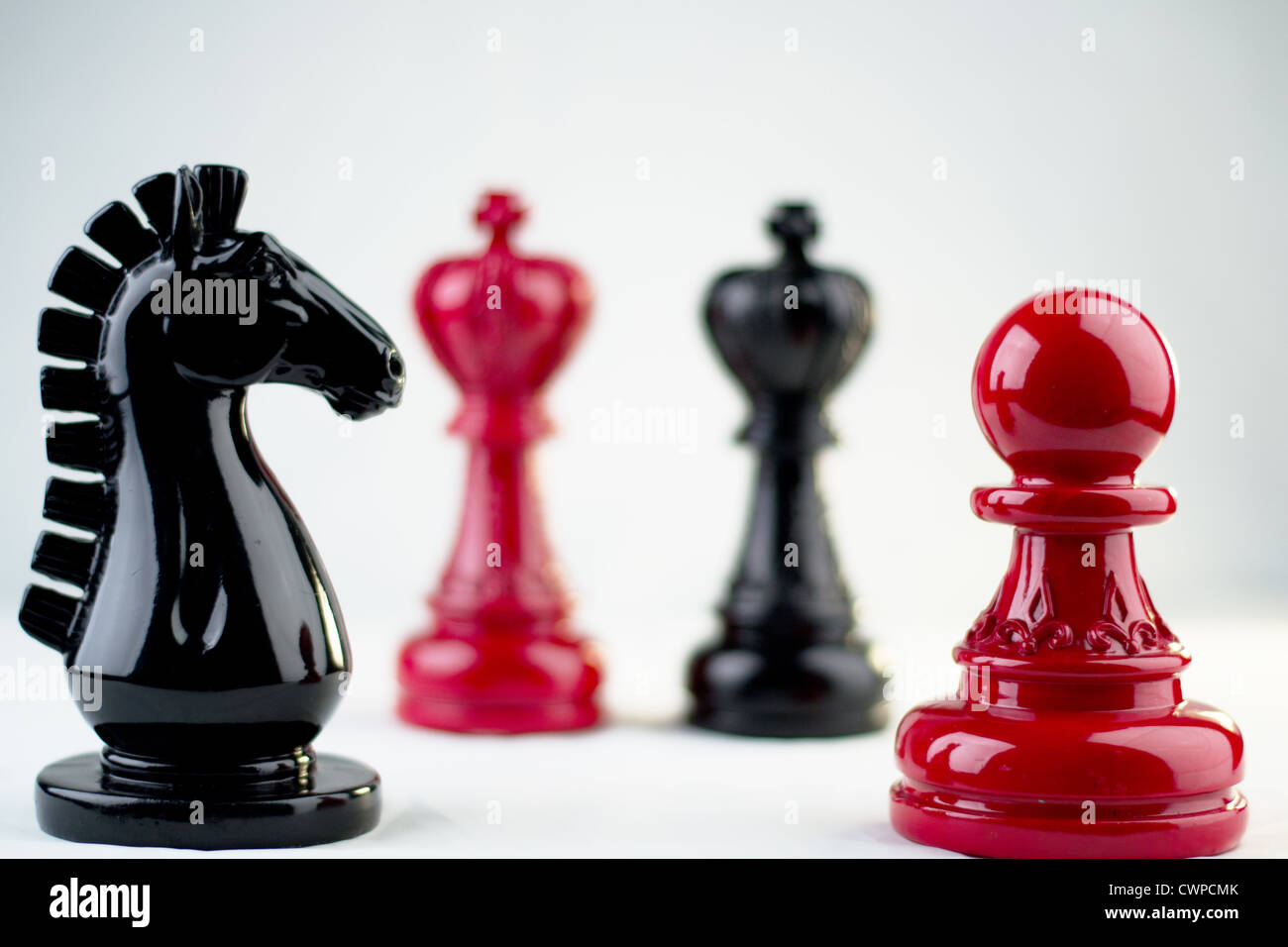Knight and pawn chess game Stock Photo - Alamy