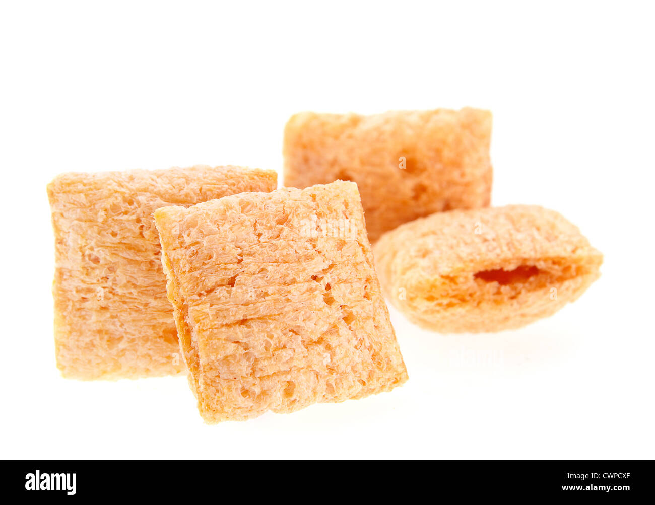 Cornflakes cube snack isolated on white Stock Photo - Alamy