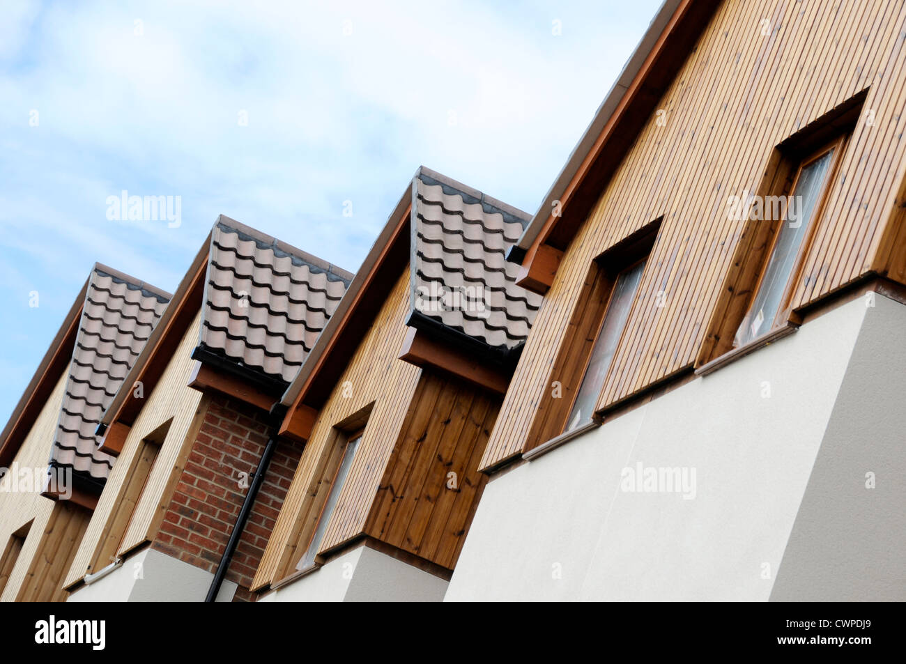 view of upper story windows of flats partly built Stock Photo - Alamy