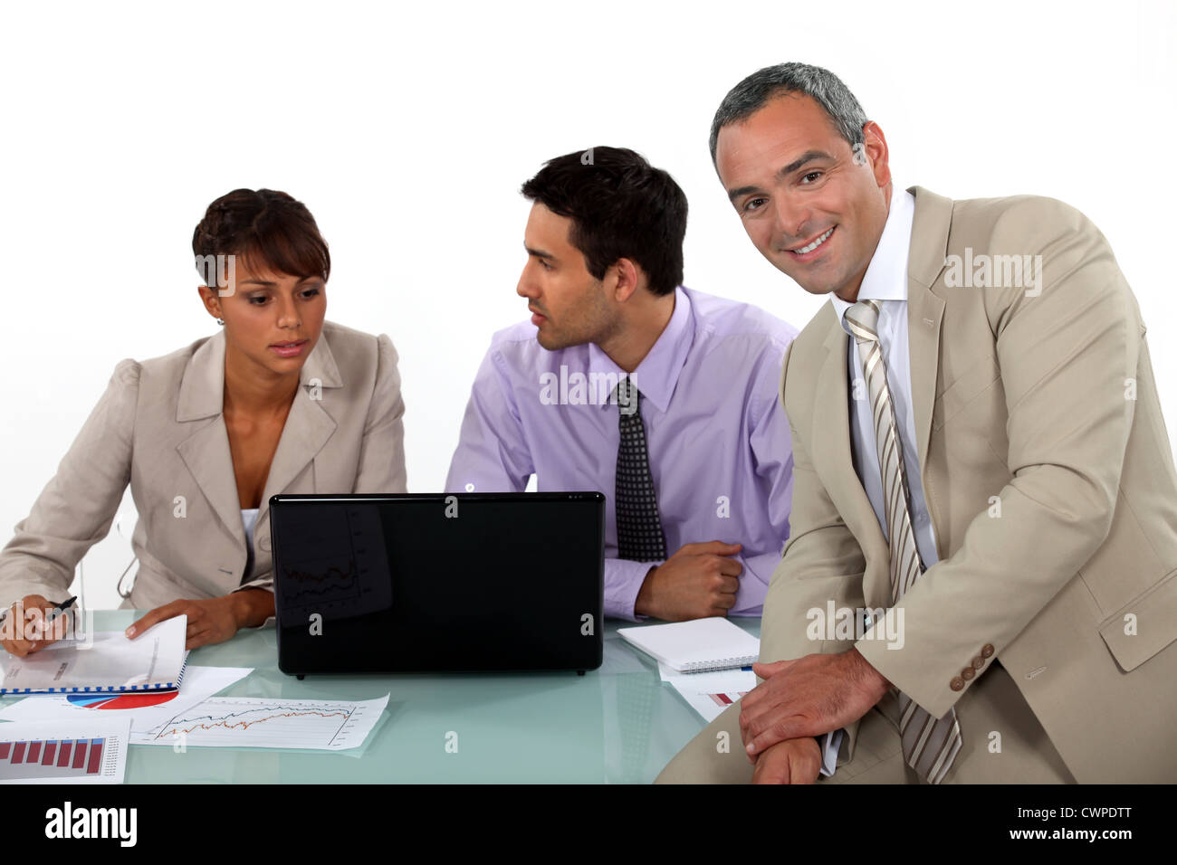Three business colleagues at a desk Stock Photo - Alamy