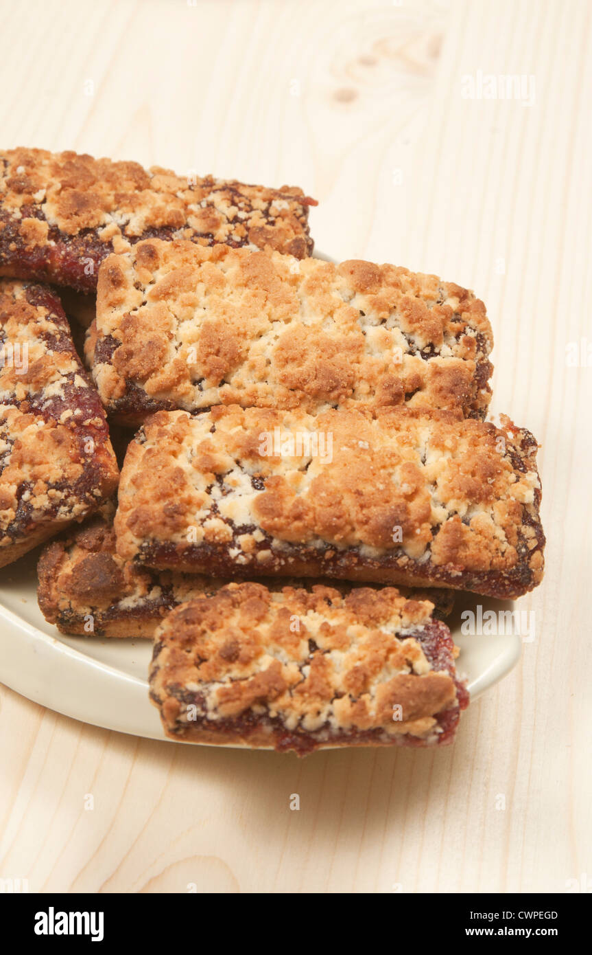Cakes with jam on a dish, close-up shot Stock Photo - Alamy