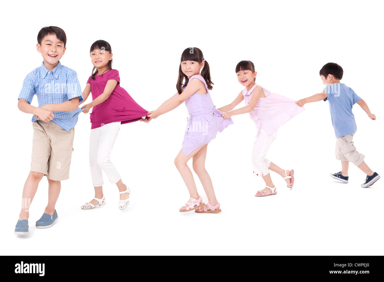 Children playing train games Stock Photo - Alamy