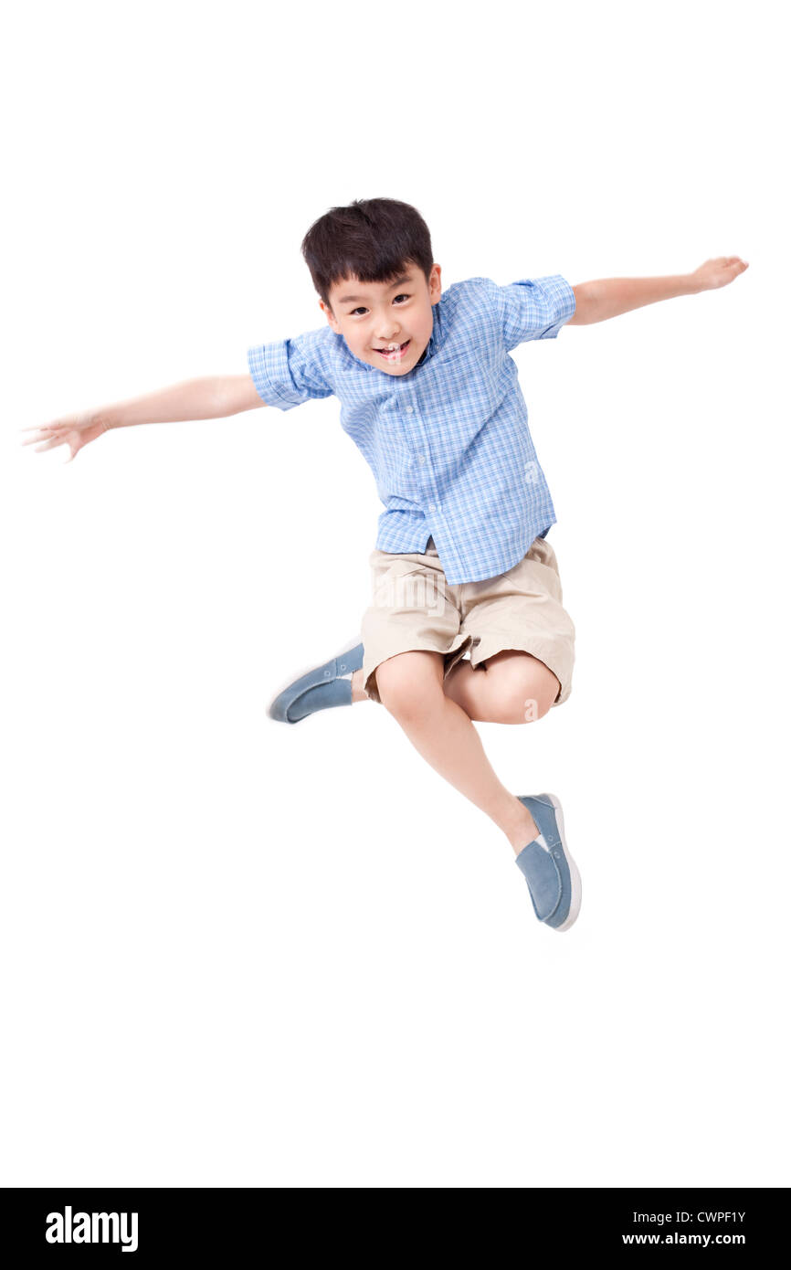 Little boy jumping with excitement Stock Photo - Alamy