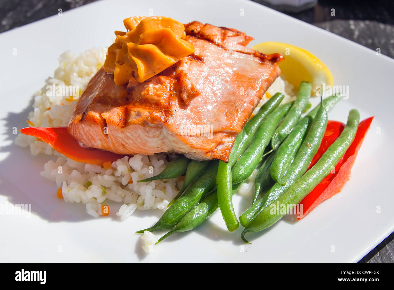 Grilled Salmon Fillet Over Basmati Rice with String Beans Bell Peppers ...