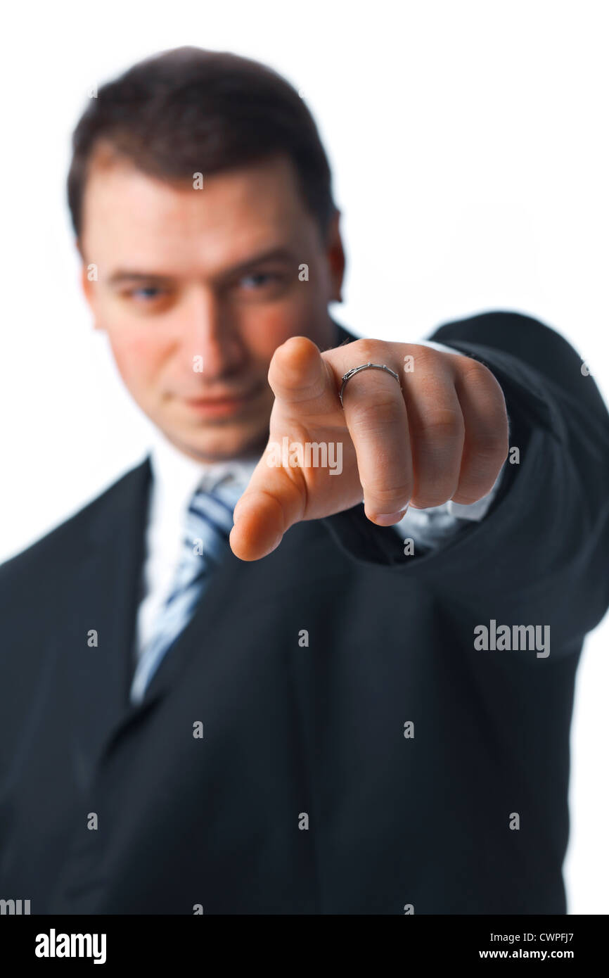 Close up portrait of young confident business man pointing to you ...