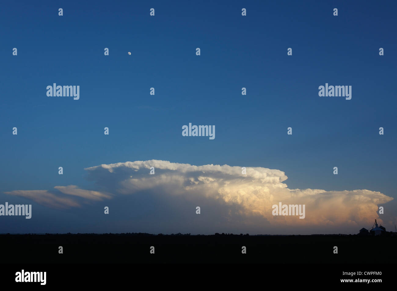Moon over severe thunderstorm in southern Nebraska Stock Photo - Alamy