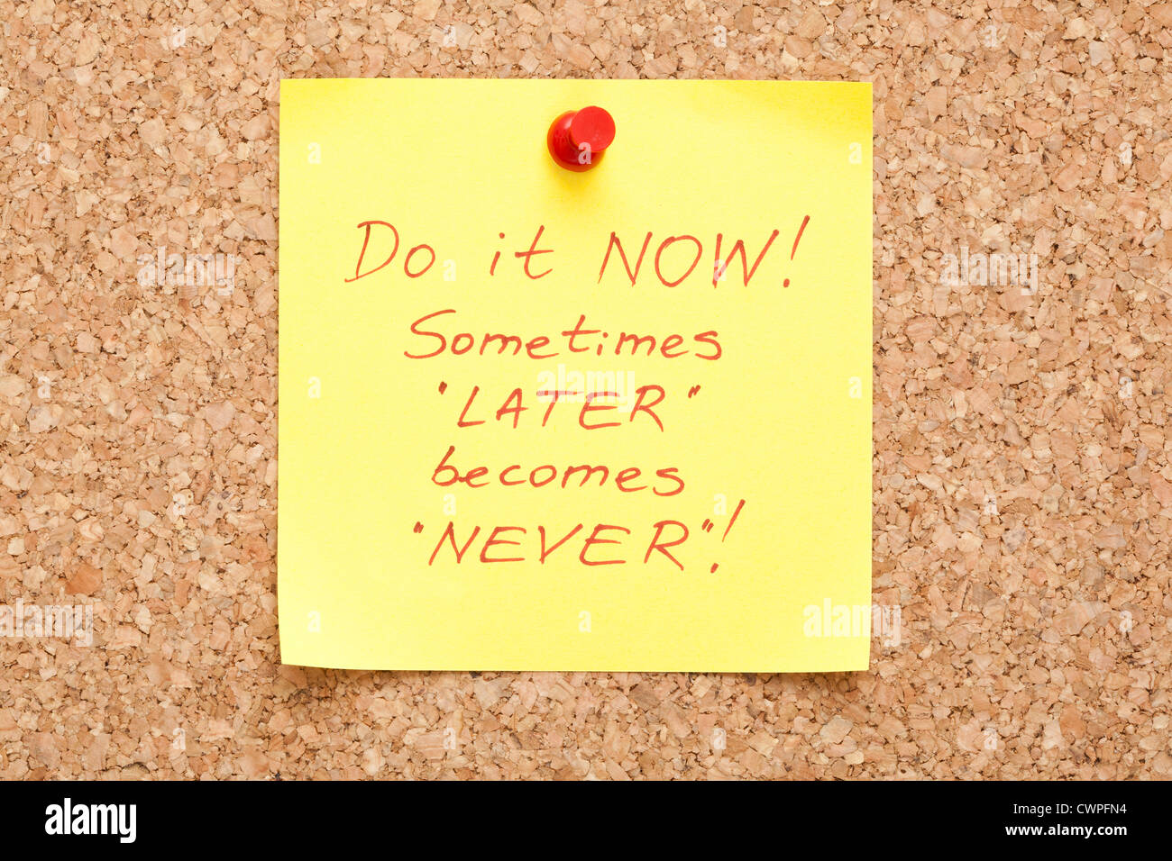 Do it Now, written on an yellow sticky note on a cork bulletin board ...