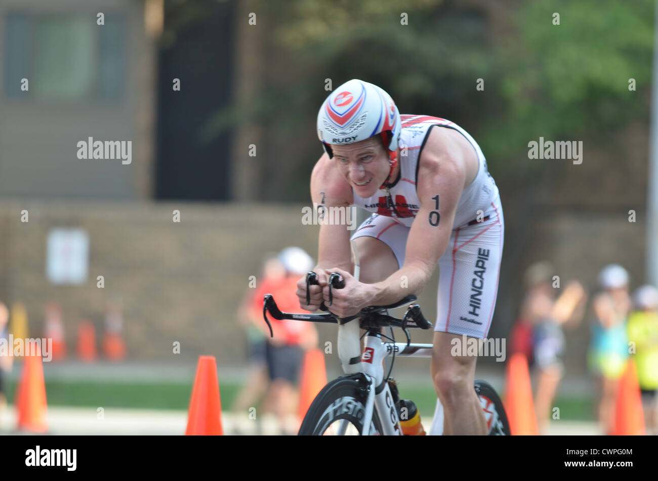 Ben Collins of the US during the bicycle portion of the 2012 Hy-Vee ...