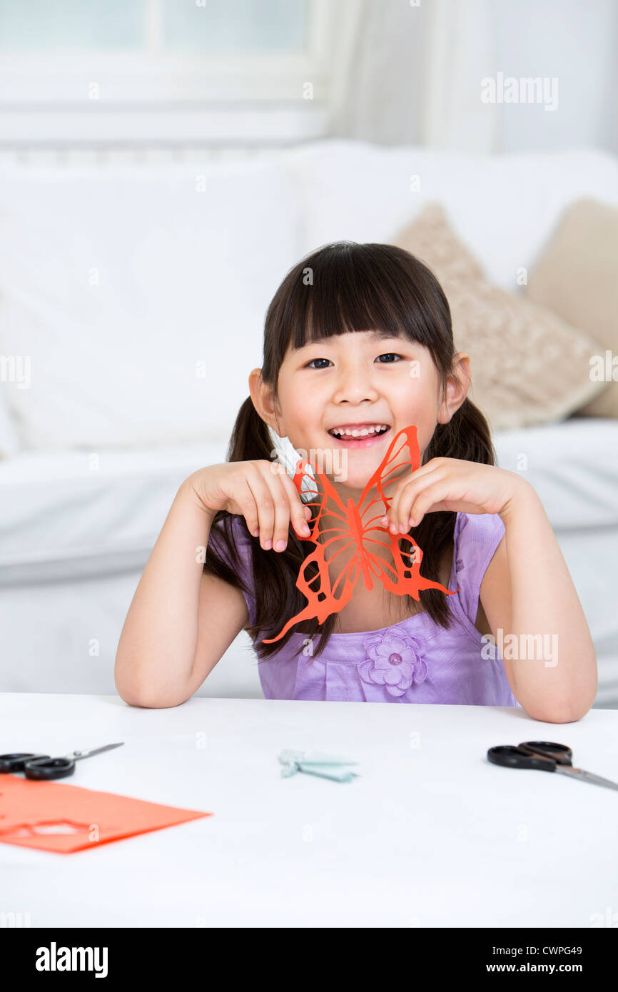 Chinese paper cut making hi-res stock photography and images - Alamy