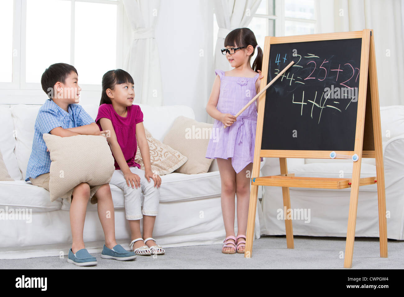 Teaching learning asia hi-res stock photography and images - Alamy