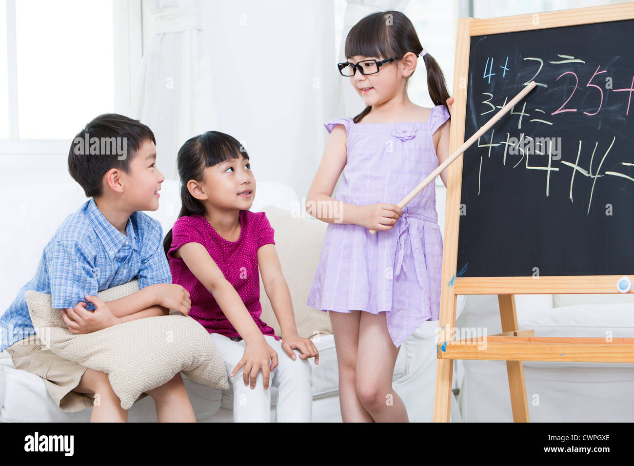 Children playing teaching game Stock Photo - Alamy