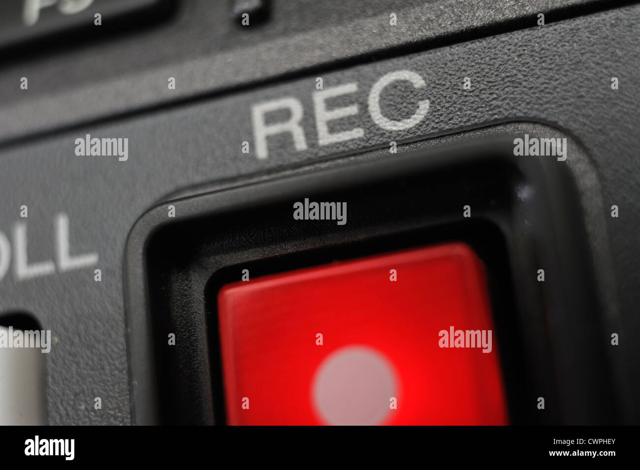 Macro shot of the red color "Record" button Stock Photo - Alamy
